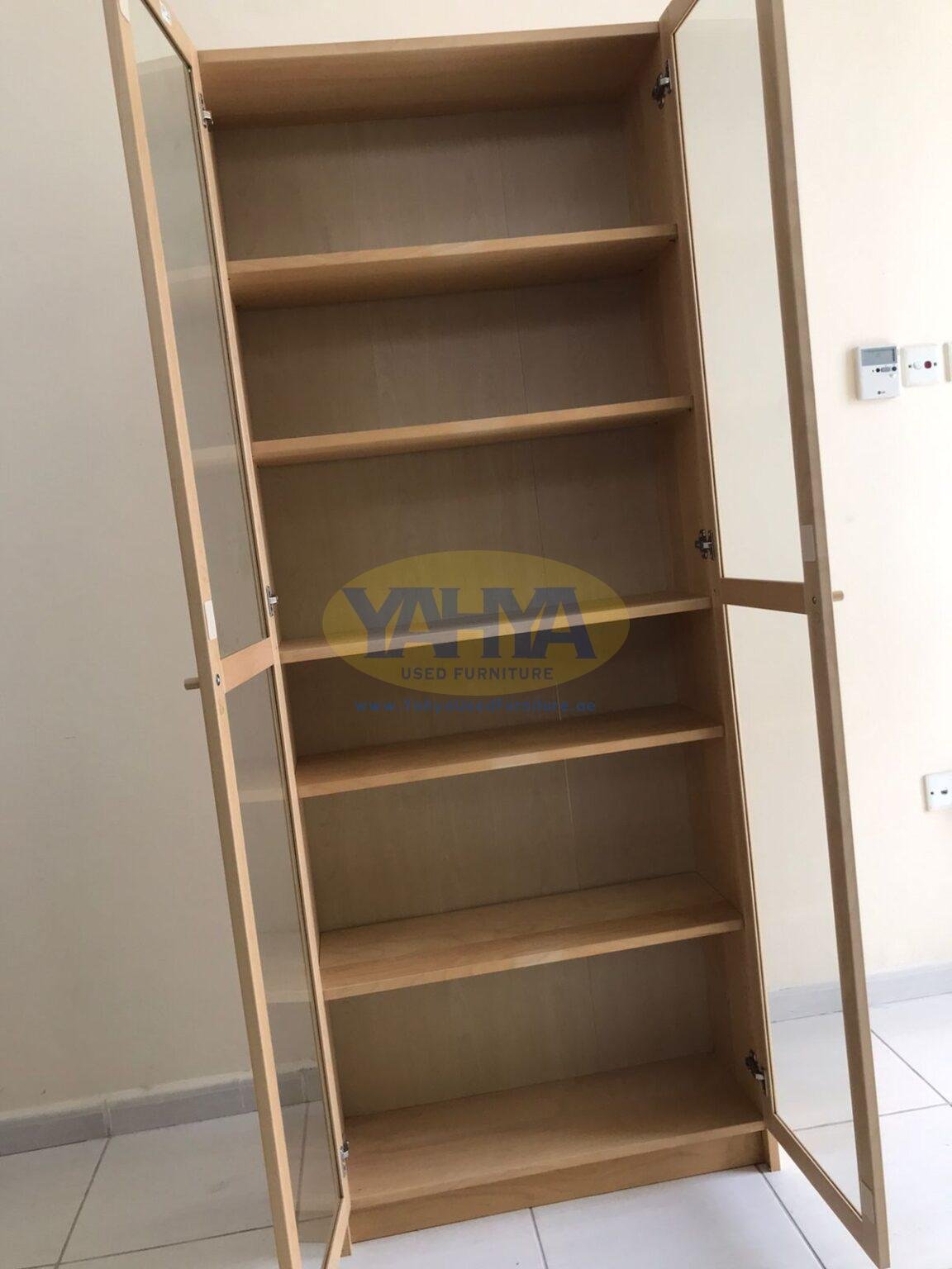 BILLY Bookcase with glass-doors, grey/metallic effect • Yahya Used ...